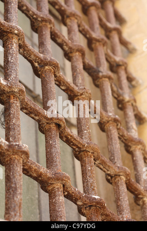 Old window with rusty iron bars and broken glass Stock Photo - Alamy