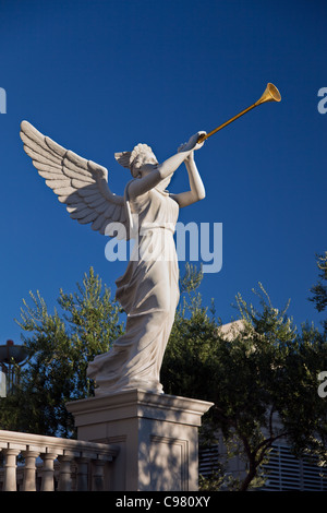 Angel Playing a Golden Bugle Stock Photo - Alamy