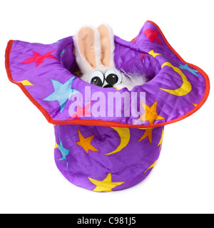 Magician pulling a rabbit out of a hat Stock Photo - Alamy