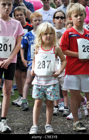 Children getting ready for a running race Stock Photo - Alamy