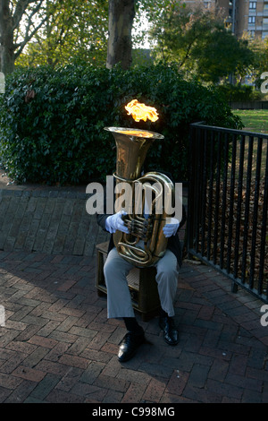 fire man playing with fire on busker fest festival Stock Photo - Alamy