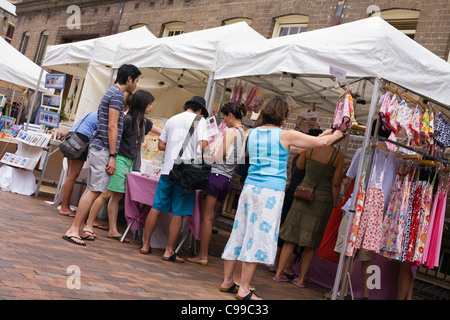 Shoppers browse the stalls at the Rocks Market. Sydney, New South Wales ...