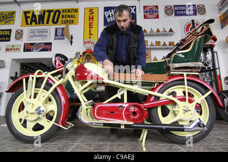 Jan Drozd pictured with nearly reconstructed motorcycle Cechie or ...