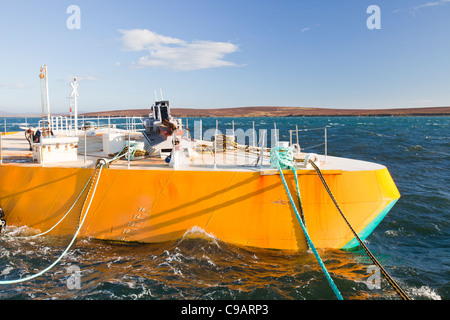 A Wello Penguin wave energy device on the dockside at Lyness on Hoy in ...