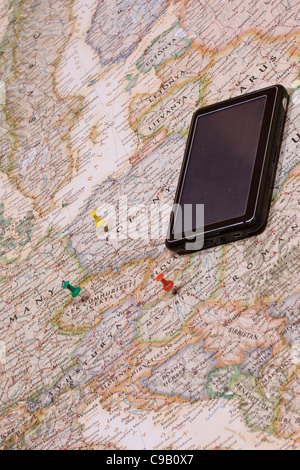 Red push pin showing the location of a destination point on a map Stock ...