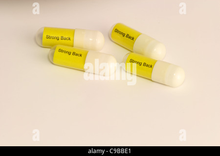 Strong healthy spine with medicine pills. Top view Stock Photo - Alamy
