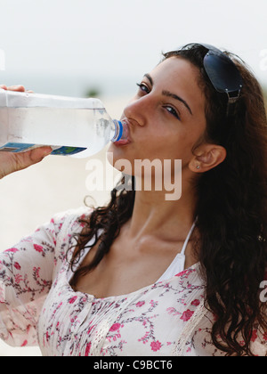Close up view young woman in a big city using phone with copy s Stock ...