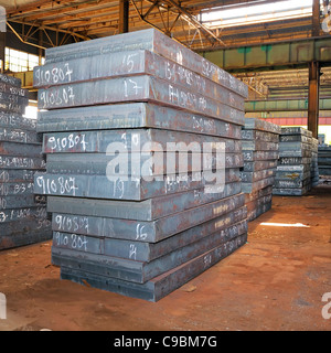 Stack of thick heavy metal plates rusty uneven surface after laser ...