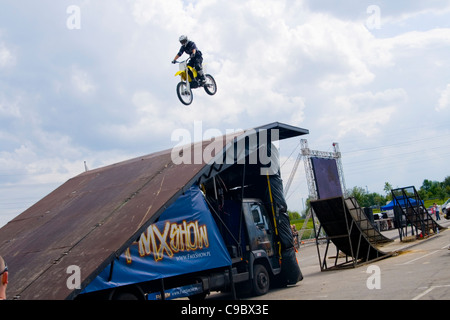 Stunt style - motorcycles trick Stock Photo - Alamy