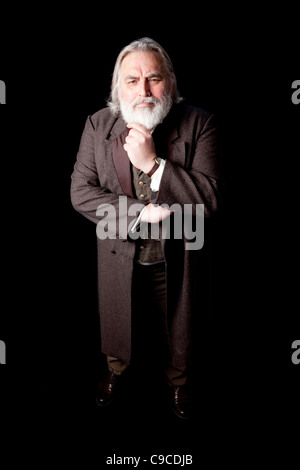 Charles Dickens actor on stag Stock Photo - Alamy