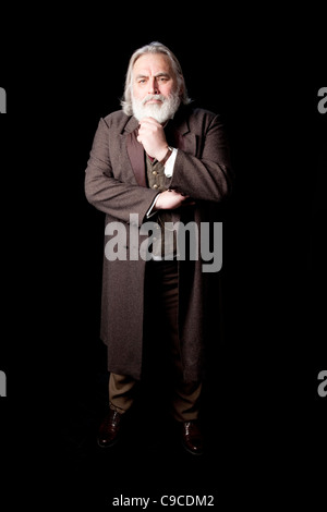 Charles Dickens actor on stag Stock Photo - Alamy