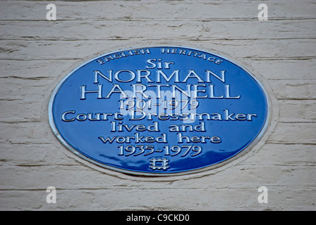 NORMAN HARTNELL - English fashion designer in his salon at 26 Bruton ...