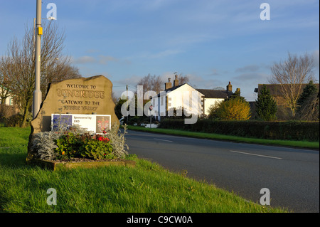 Stone sign, welcome to Longridge Stock Photo - Alamy