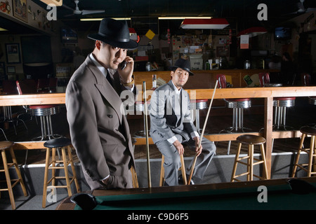 Gangsters in a pool hall Stock Photo - Alamy