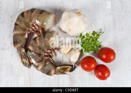 Fresh raw big prawn tails on wooden background Stock Photo - Alamy