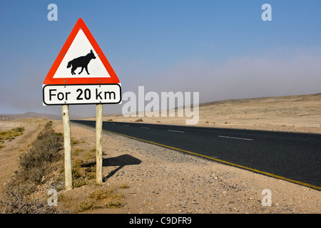 Warning sign for brown hyenas on highway, Namibia Stock Photo - Alamy