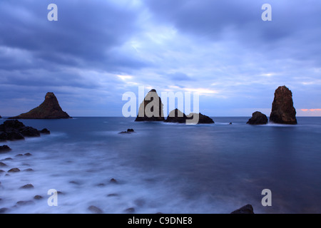 Acitrezza rocks of the Cyclops, sea stacks in Catania, Sicily, Italy ...