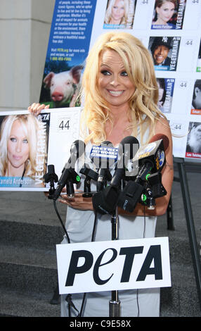 PETA Goes Postal: Pamela Anderson Unveils Vegetarian Icons Postage ...