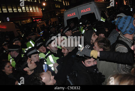 Protesters clash with riot police, following a massive demonstration to ...