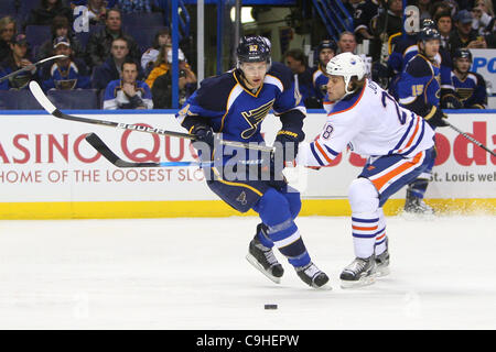 St. Louis Blues defenseman Ryan Suter, left, defends against Winnipeg ...