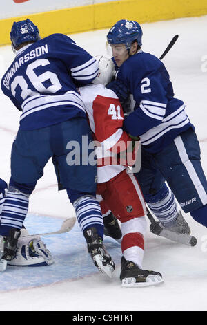 Detroit Red Wings' Chris Conner (41) protects the puck from Chicago ...
