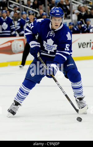 Toronto Maple Leafs defenseman Jake McCabe (22) skates with the puck in ...