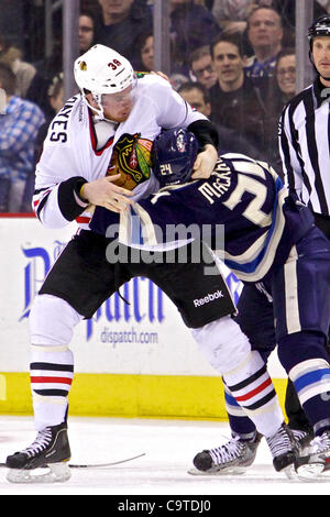 Chicago Blackhawks right wing MacKenzie Entwistle (58) attempts to ...