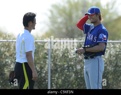 Texas Rangers pitcher Akinori Otsuka, of Japan, warms up before ...