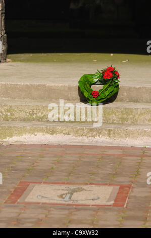 A wreath of red roses is laid on the grave of Catherine Mompesson prior ...
