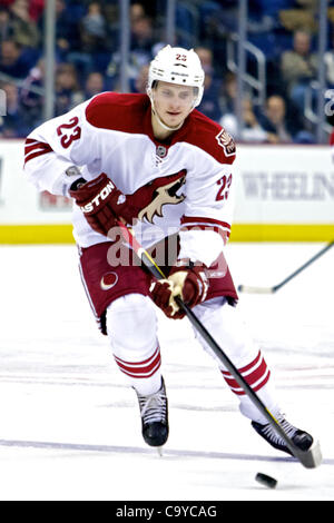 Phoenix Coyotes defenseman Oliver Ekman-Larsson, right, of Sweden, gets ...