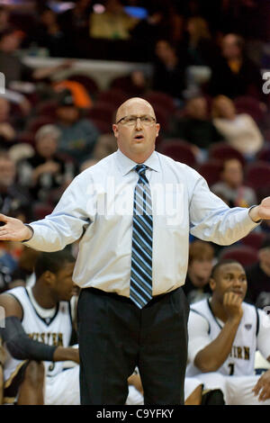 Western Michigan head coach Steve Hawkins courtside in the first half ...