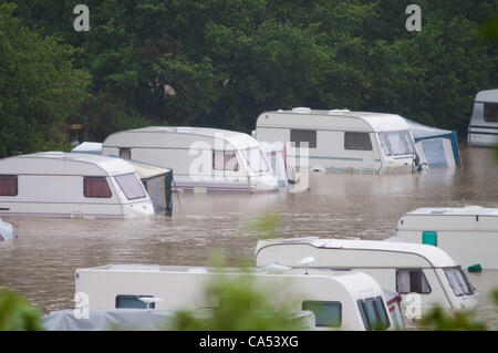 A caravan park inundated by flood water after the River Nidd burst its ...