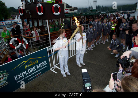 Stephanie Booth And Jan Booth with Olympic torch steam cruiser The Tern ...