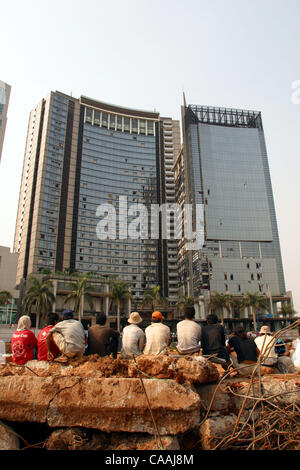 JAKARTA, INDONESIA AUGUST 5, 2003: A bombing victim is wheeled in to ...