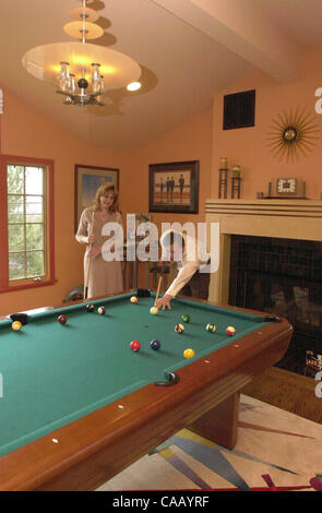 Jeff and Linda Brader, Lafayette in their lining room with their french ...