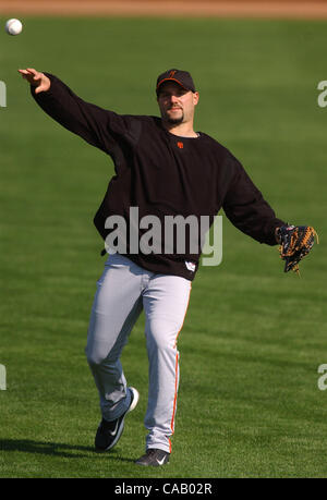 San Francisco Giants Dustan Mohr, #22, slides at homeplate giving the ...
