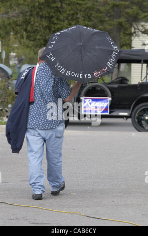 May 11, 2004; Charlevoix, MI, USA; PATSY RAMSEY presses palms while ...