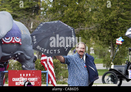 May 11, 2004; Charlevoix, MI, USA; PATSY RAMSEY presses palms while ...