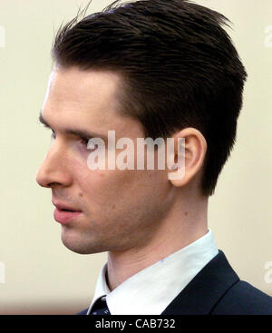 Justin Helzer sits in Dept 4 at the Bray Court Building Friday morning ...