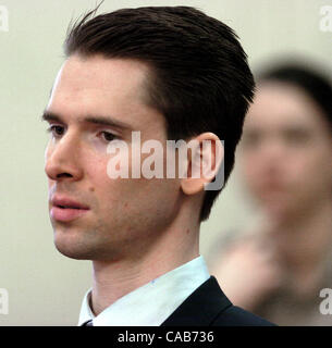 Justin Helzer sits in Dept 4 at the Bray Court Building Friday morning ...