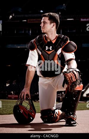 San Francisco Giants' Buster Posey makes contact with the ball during a ...