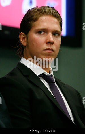Washington Capitals player Nicklas Backstrom, front, takes part in a ...