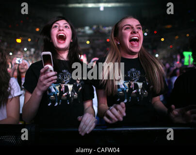 Two front row fans reacted as the Jonas Brothers take the stage at the ...