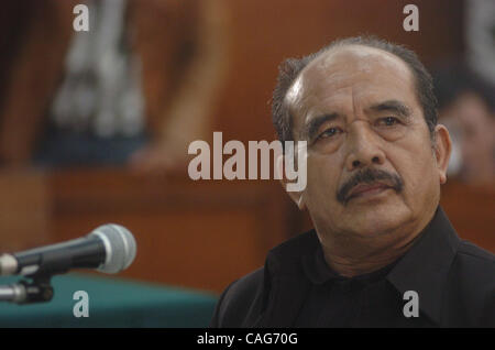 The leader of the Al Qiyadah Al Islamiyah sect Ahmad Mushaddeq listens ...