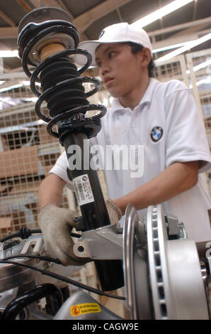 Worker works at BMW assembling factory in Jakarta, Indonesia. Tuesday ...