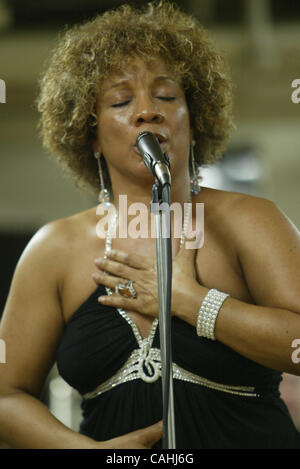 Singer and percussionist Choco Orta and her Orchestra during a ...