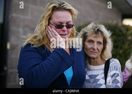 Heidi Patterson, left and family friend Sharon Babb, wait for Patterson ...