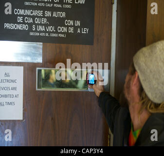 Manuel Ramos and Jay Cicinelli enter the courtroom at the Orange County ...