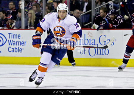 New York Islanders' Micheal Haley, right, attempts to deflect a shot on ...