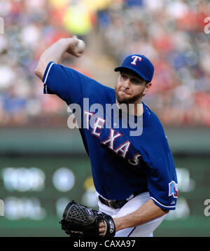Texas Rangers pitcher Scott Feldman, left, ducks out of the way as ...